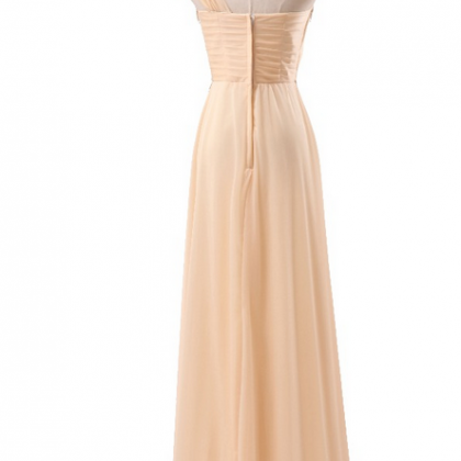 The Shoulders Of The Handsome Evening Gown With A Chiffon Gown Are ...
