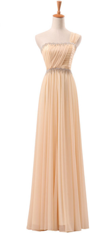 The Shoulders Of The Handsome Evening Gown With A Chiffon Gown Are ...