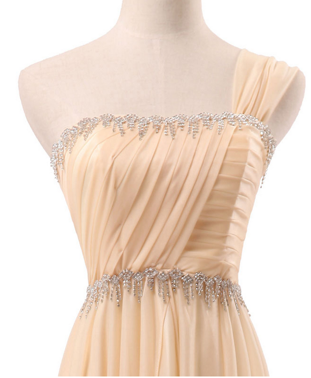 The Shoulders Of The Handsome Evening Gown With A Chiffon Gown Are ...